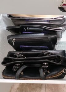 Organize Purses in a Cabinet with Lighting | Porch Daydreamer